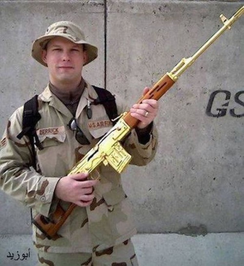 Photos of Saddam Hussein's Gold Gun collection