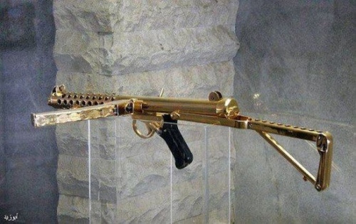 Photos of Saddam Hussein's Gold Gun collection