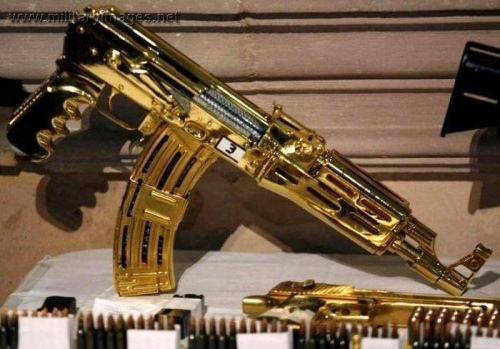 Photos of Saddam Hussein's Gold Gun collection