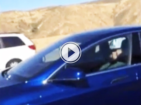 Guy driving new Tesla uses Auto-pilot to get to work