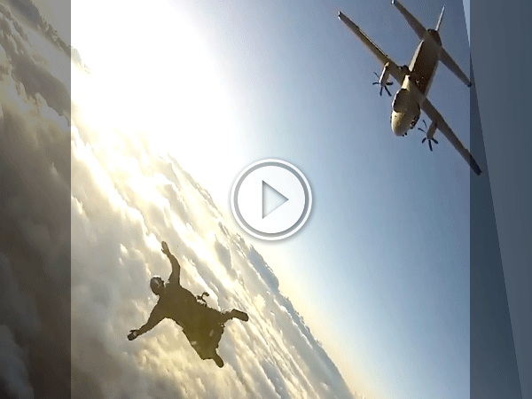 UK soldiers skydiving through the Clouds