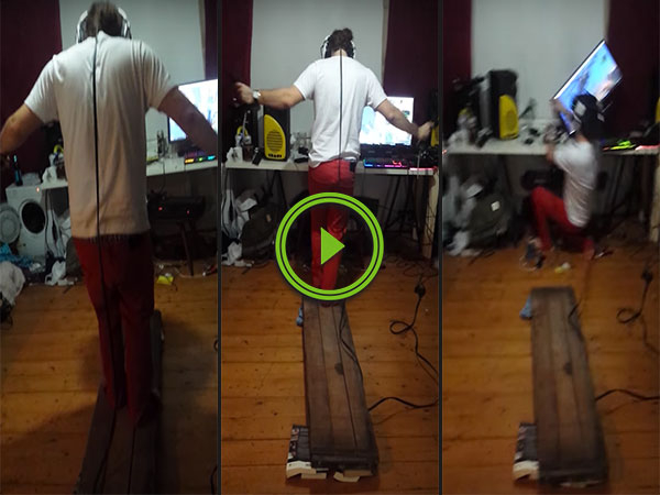 Man using VR falls off plank and onto computer (Video)