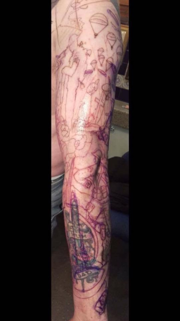 Man covers up regretful tattoo with incredible WW1 mural