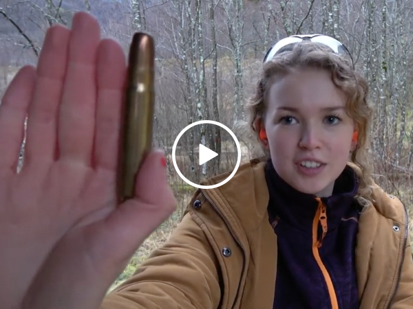 Girl shoot massive bullet and takes recoil like a champ