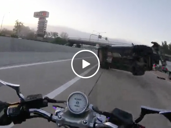 Lucky motorcyclist survives crazy freeway crash
