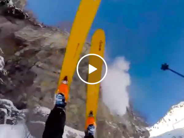 Skier takes surprising tumble off 150ft cliff and survives (Video)