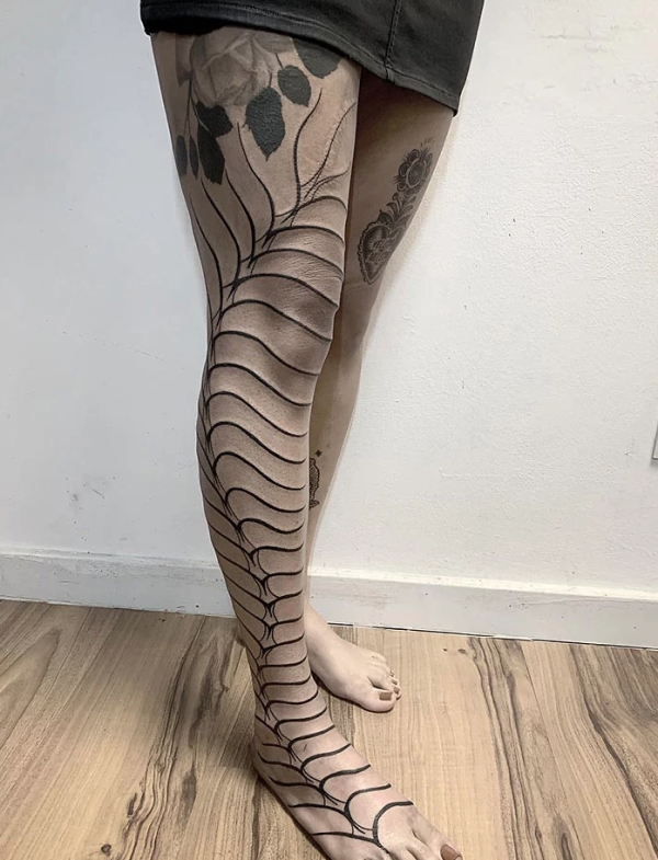 Incredible leg tattoos