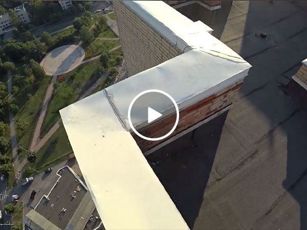 Guy falls off building rescued by friend