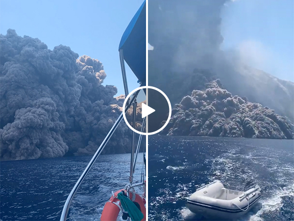 Boaters narrowly escape erupting volcano spewing a river of lava into ...