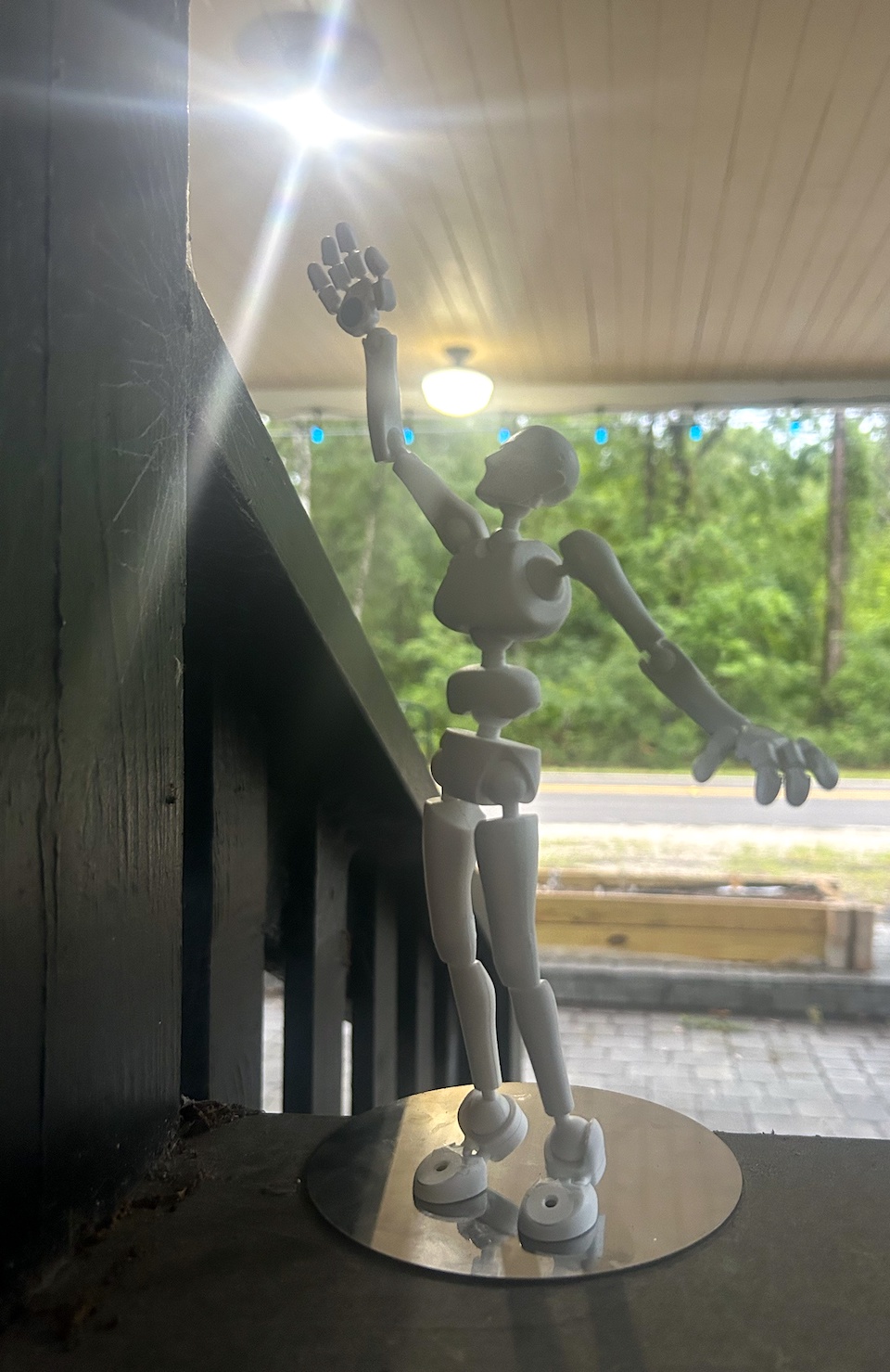 High-Res Small Robot named Delroy Adapting to living in a Human World