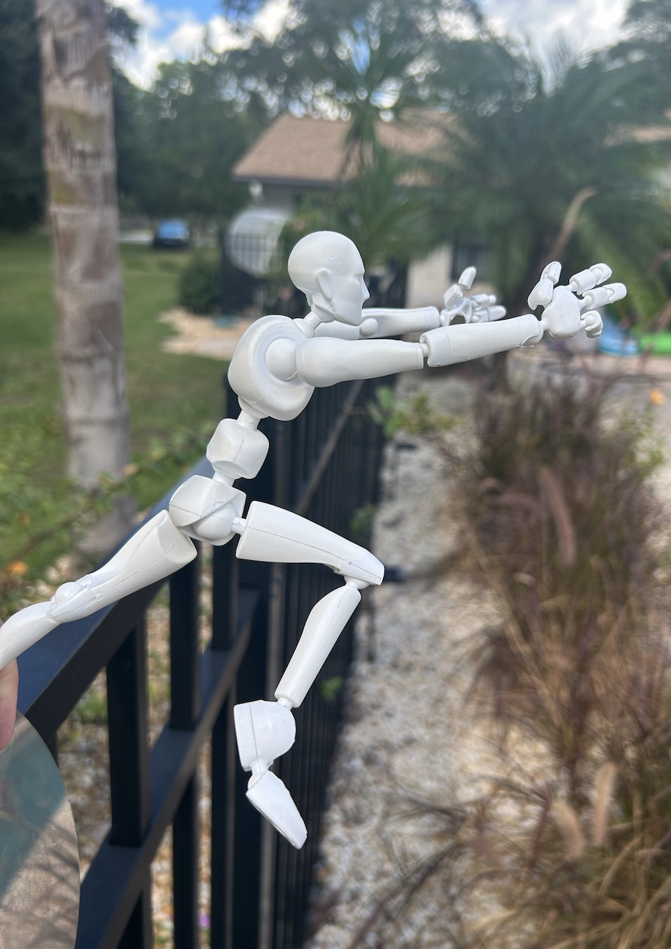 High-Res Small Robot named Delroy Adapting to living in a Human World