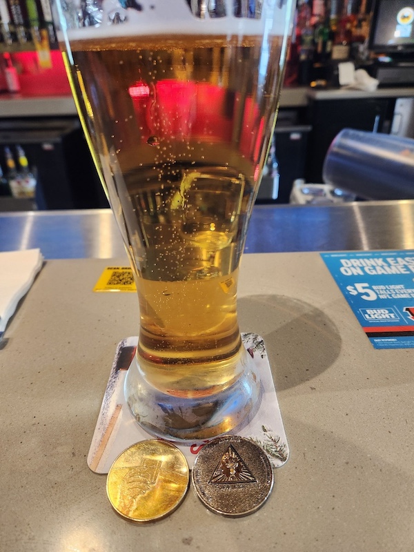 People celebrating the end of a workweek by raising a glass