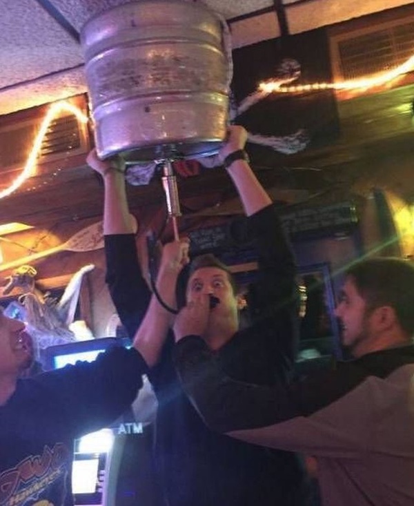 People raise a glass and toast to their friends and family